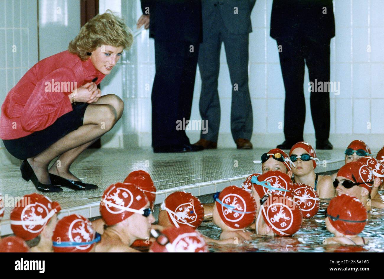 Britain's Princess Diana, the Princess of Wales, chats with the ...
