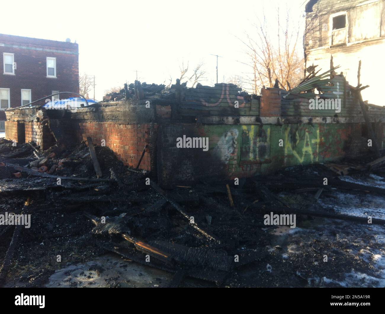 This Friday, March 7, 2014 photo shows the remnants of a house that was ...