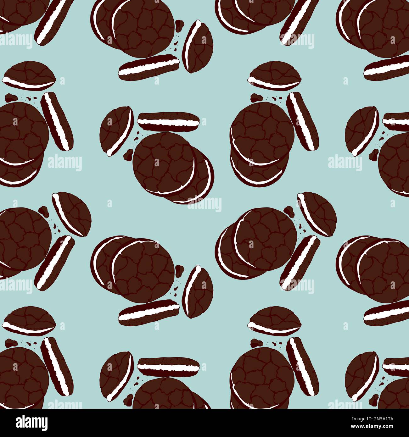 Pattern of chocolate chip cookies with filling and biscuit crumbs on a ...