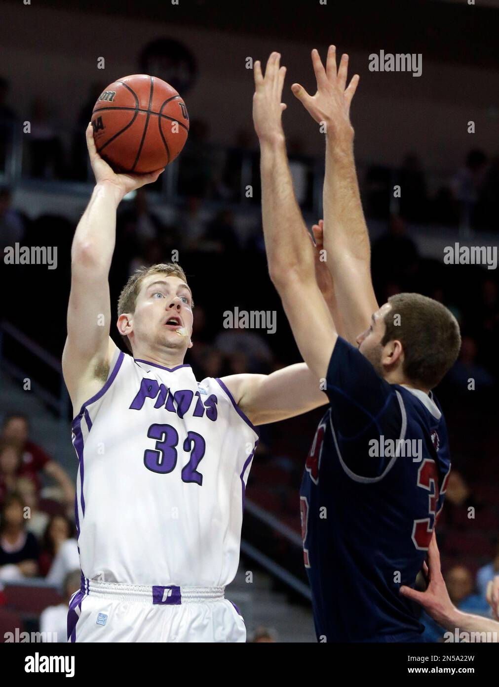 Portland's Ryan Nicholas shoots during a West Coast Conference ...