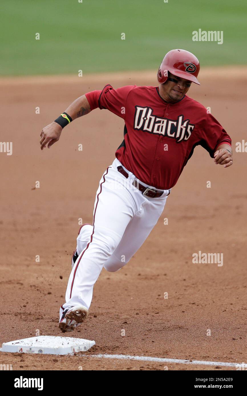 Arizona Diamondbacks' Gerardo Parra rounds third base while playing the ...