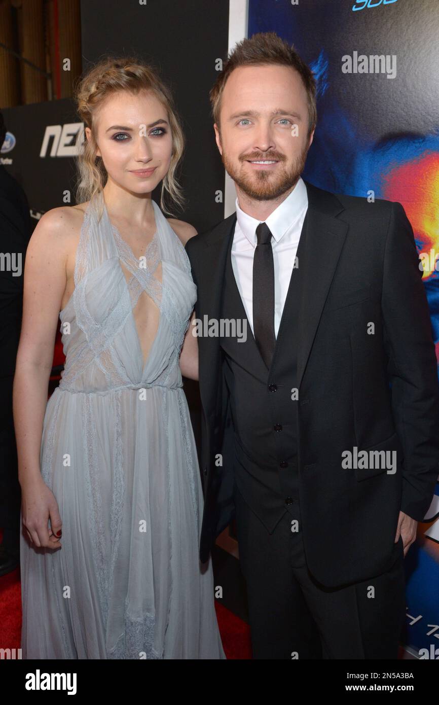 Imogen Poots, left, and Aaron Paul arrive at the US premiere of "Need ...