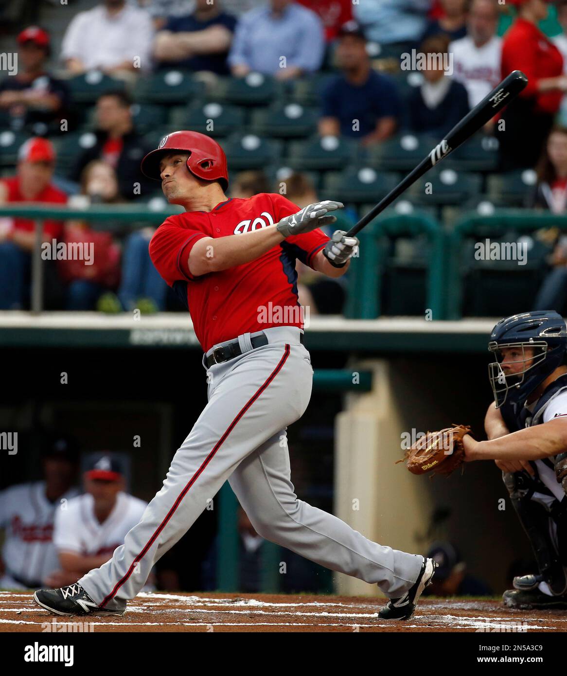 Washington Nationals first baseman Tyler Moore (12) bats in a spring ...