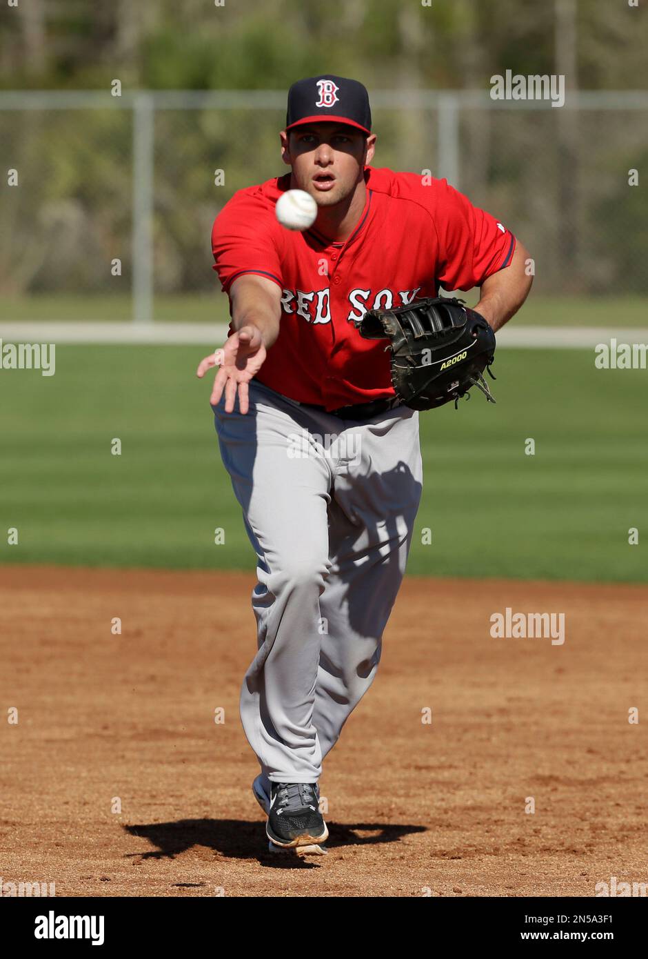 Boston Red Sox right fielder Alex Hassan fields the ball during spring ...