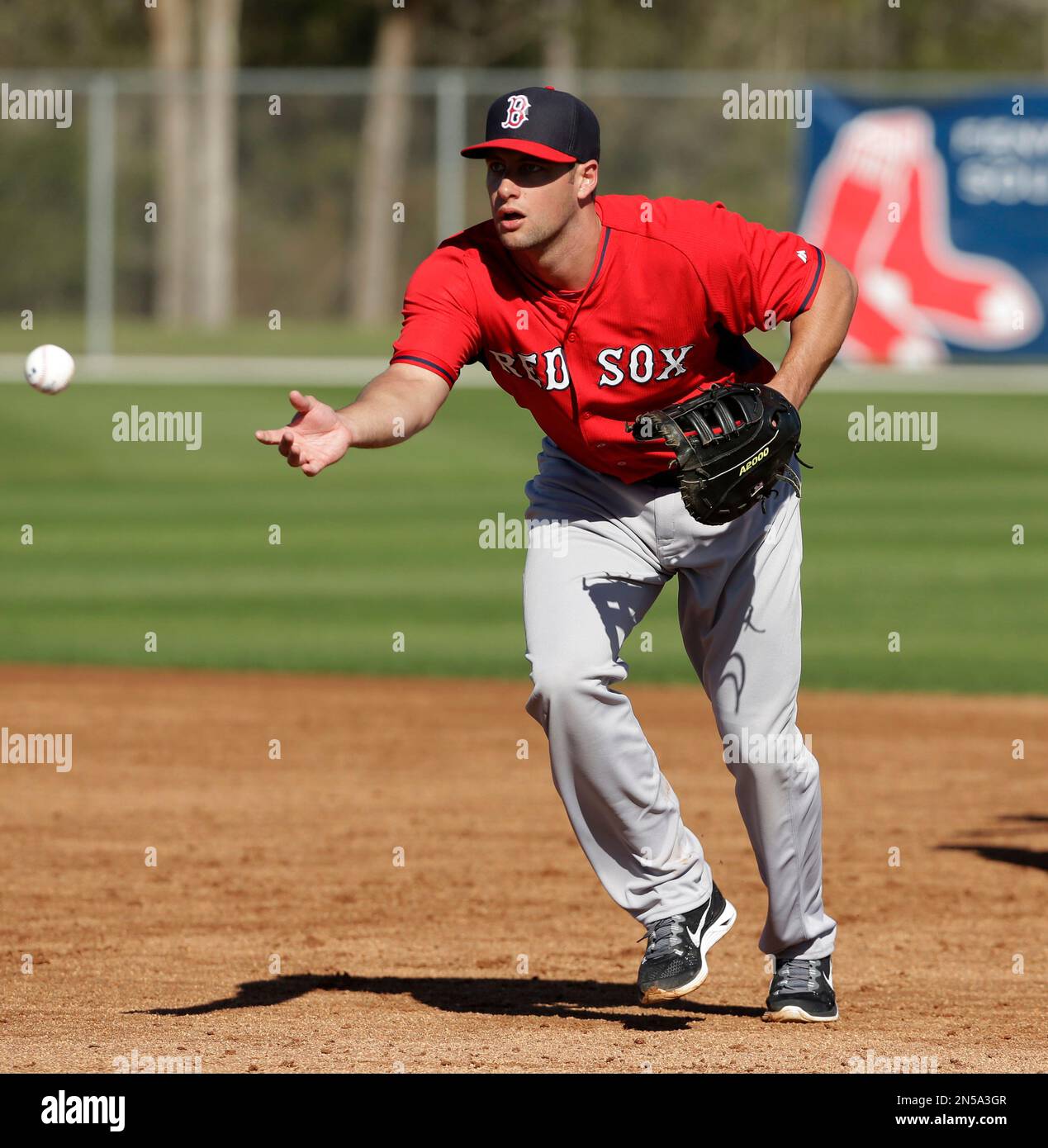 Boston Red Sox right fielder Alex Hassan fields the ball during spring ...
