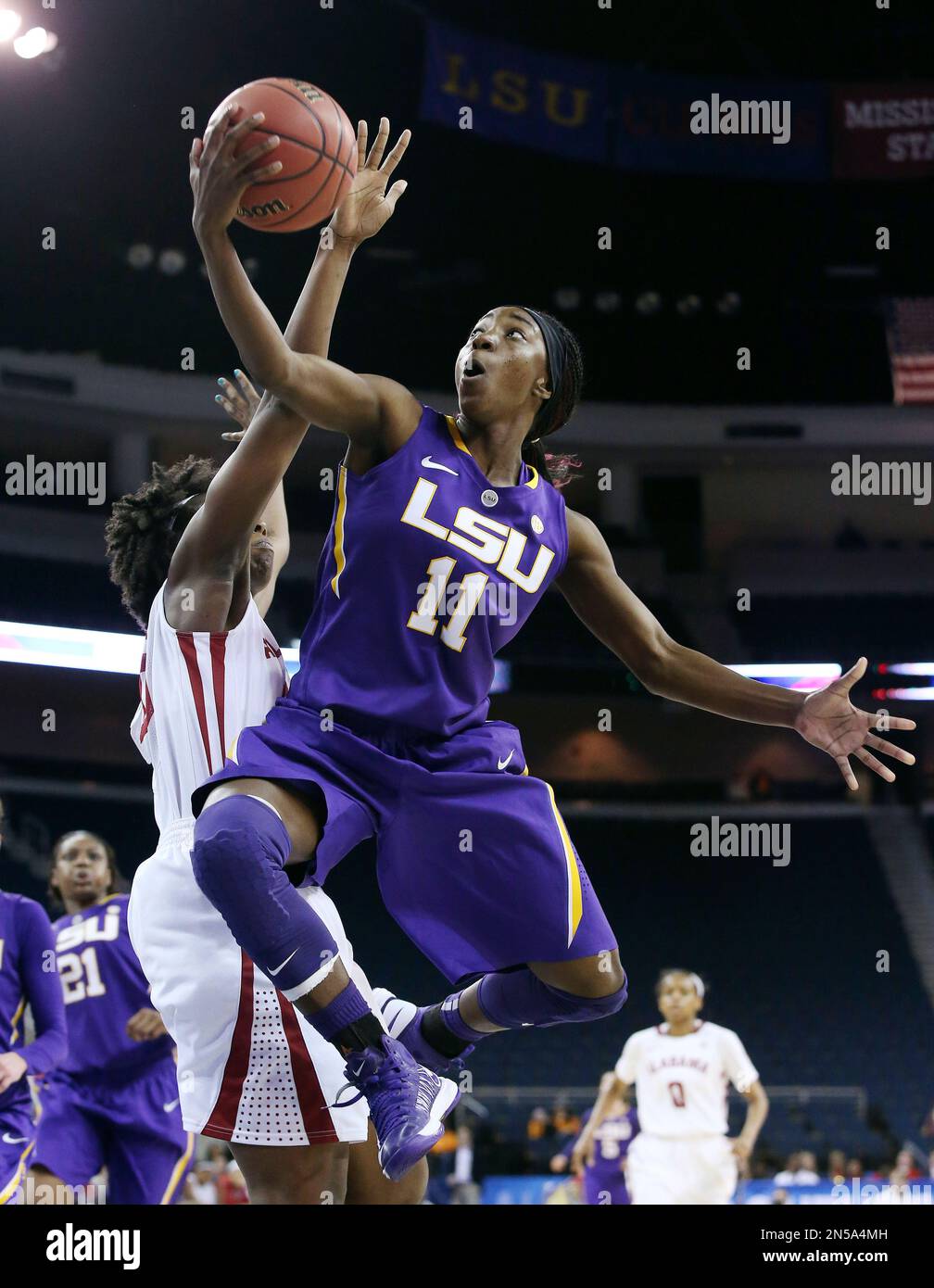LSU Raigyne Moncrief (11) goes up for a basket against Alabama forward ...