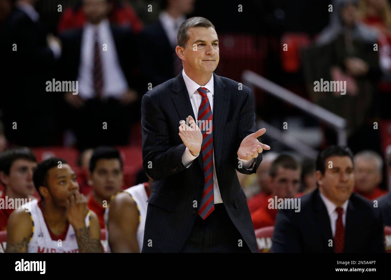 Maryland head coach Mark Turgeon claps in the first half of an NCAA ...