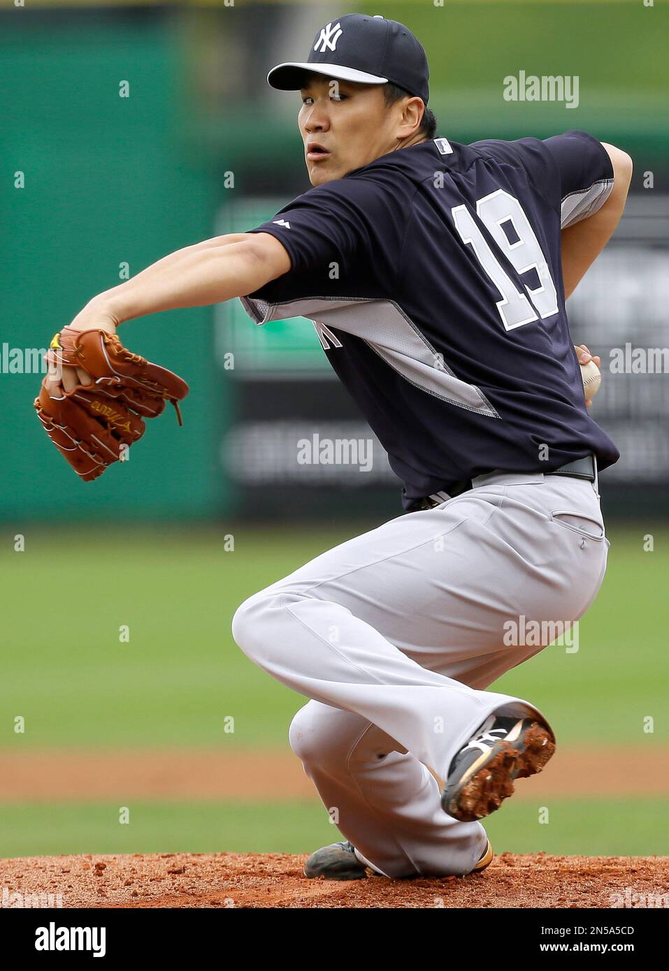 New York Yankees starting pitcher Masahiro Tanaka throws a pitch during ...