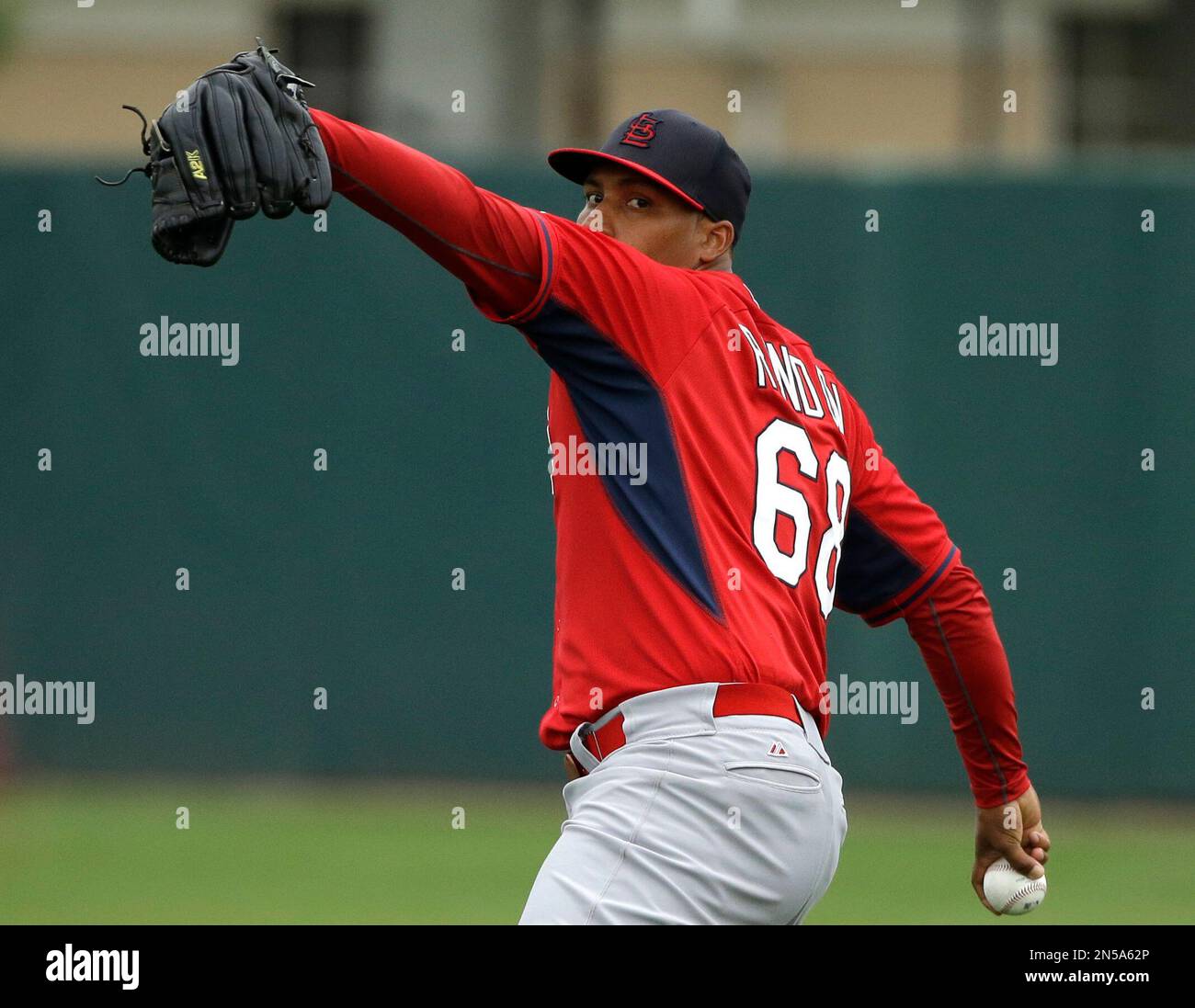 St. Louis Cardinals pitcher Jorge Rondon warms up on the field before ...