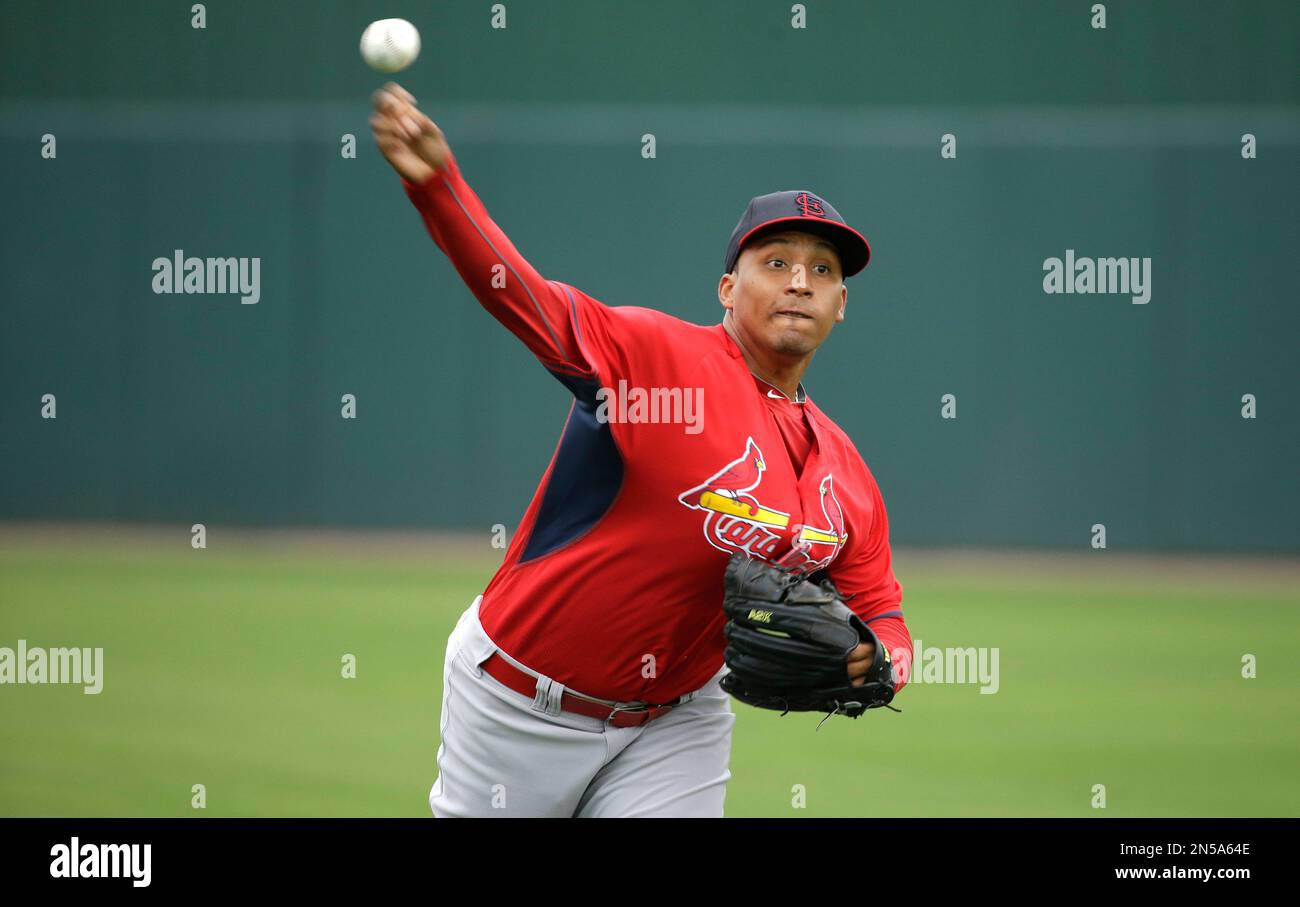 St. Louis Cardinals pitcher Jorge Rondon warms up on the field before ...