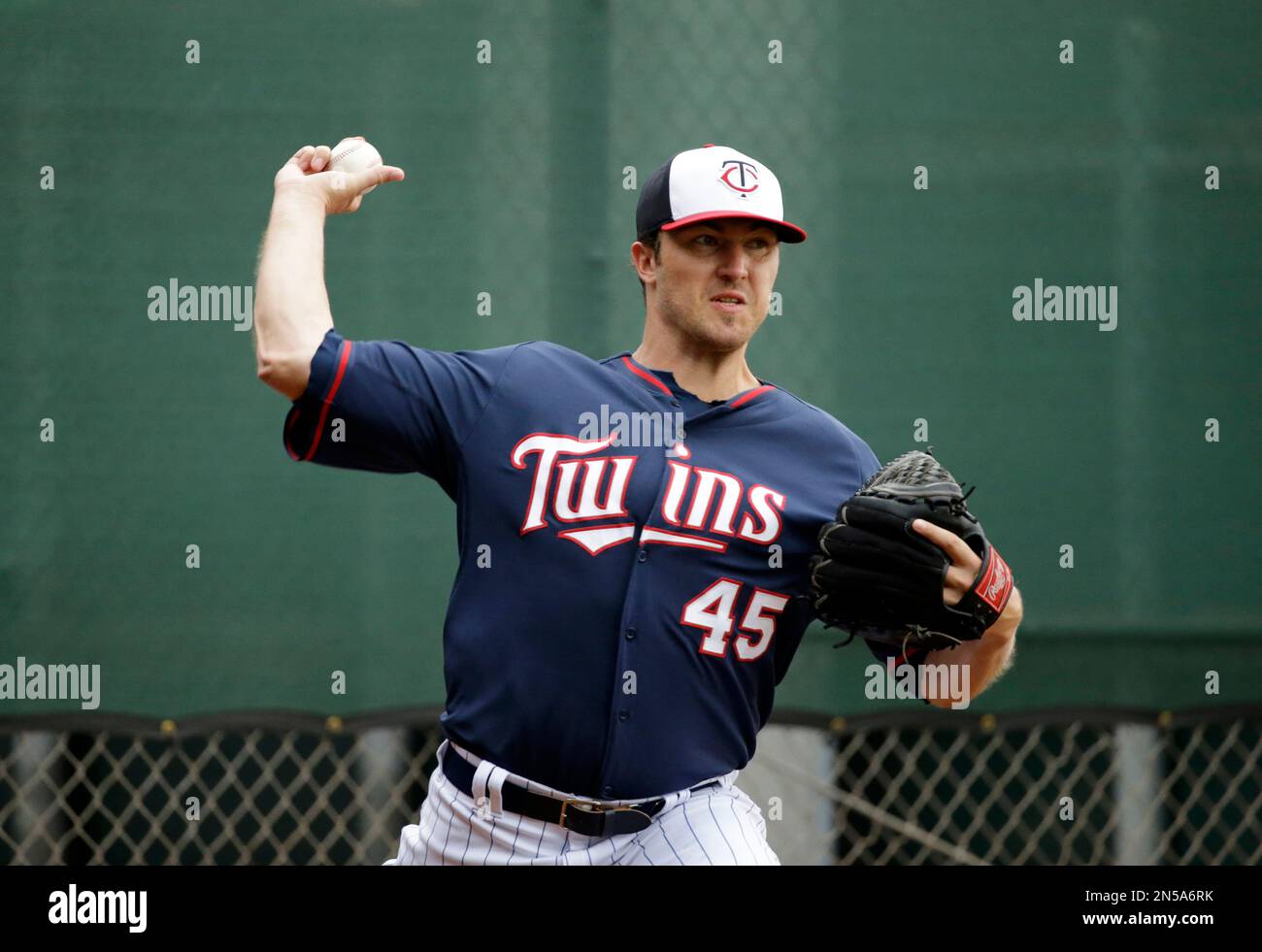 Minnesota Twins pitcher Phil Hughes works out in the bullpen before an ...