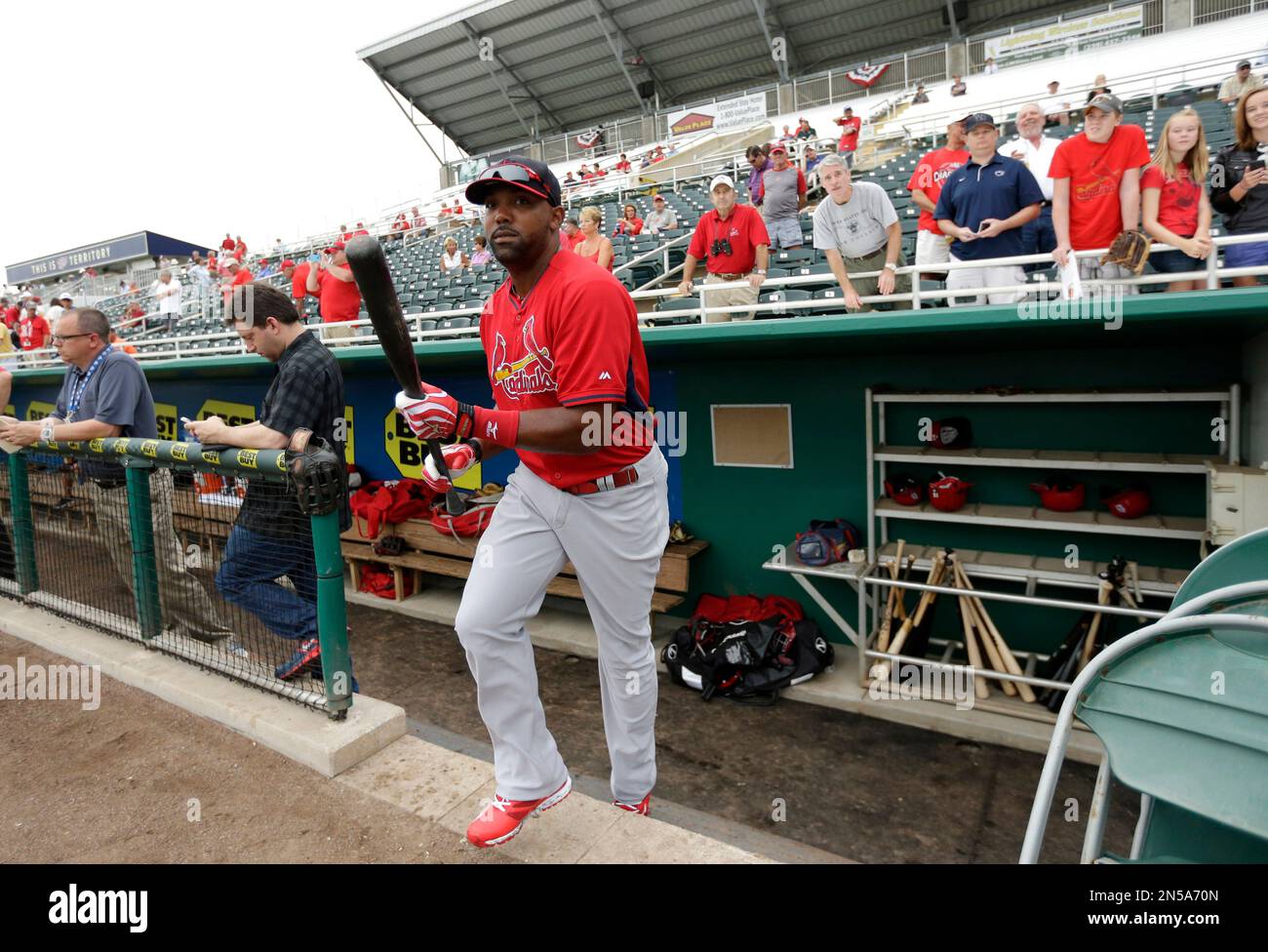 St. Louis Cardinals right fielder Joey Butler steps out of the dugout ...