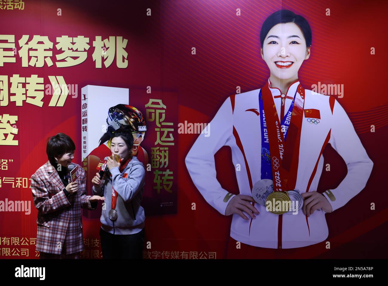 Olympic Champion Chinese aerial skier Xu Mengtao attended a book ...