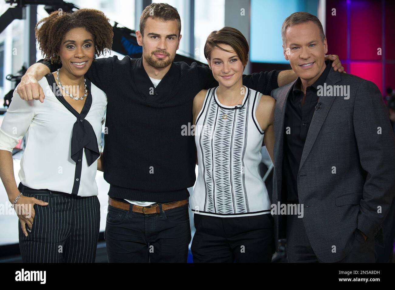 Host Rosey Edeh, actor Theo James, actress Shailene Woodley and anchor ...