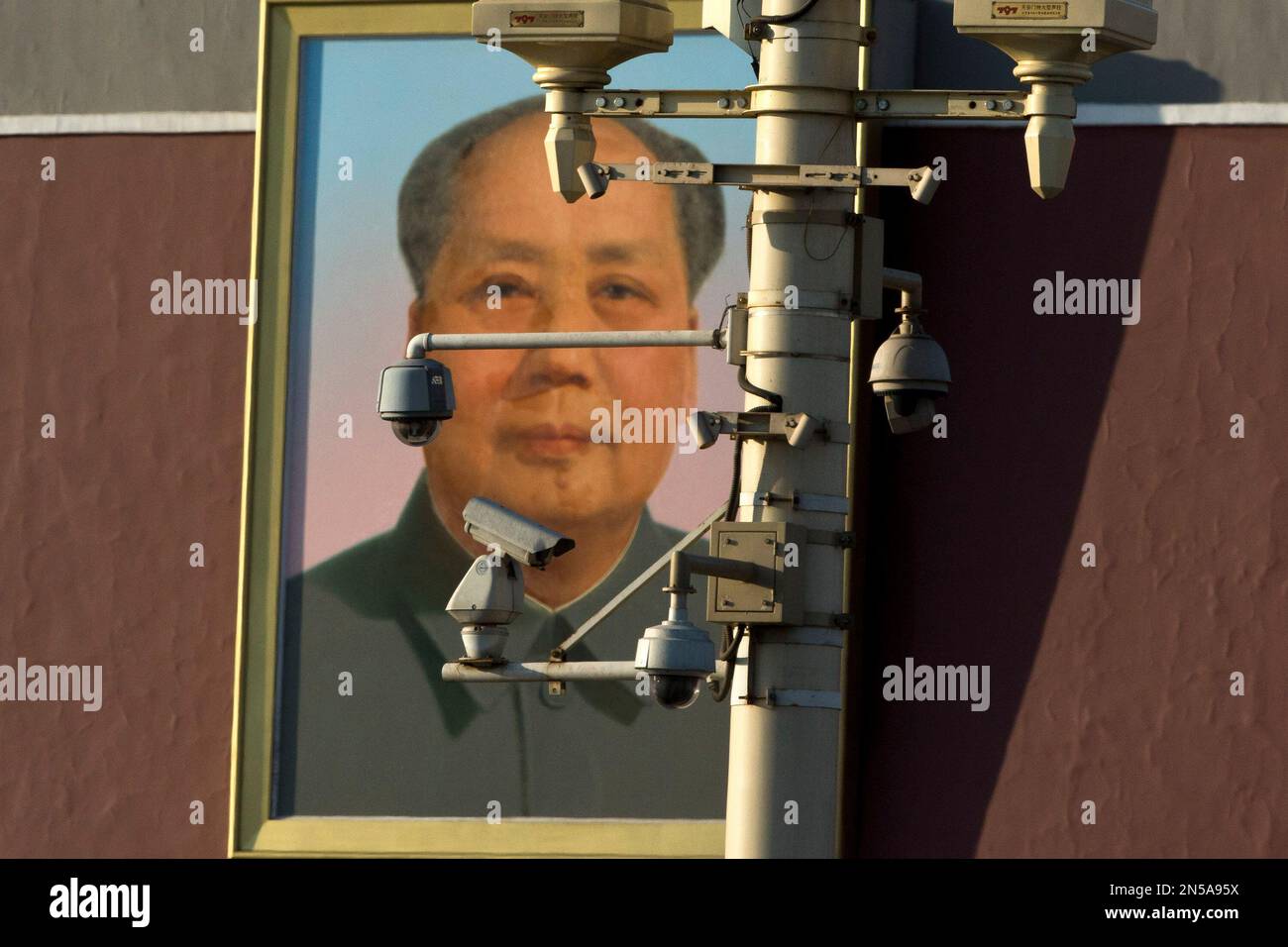 Security cameras are installed on a lamp post in front of Tiananmen ...