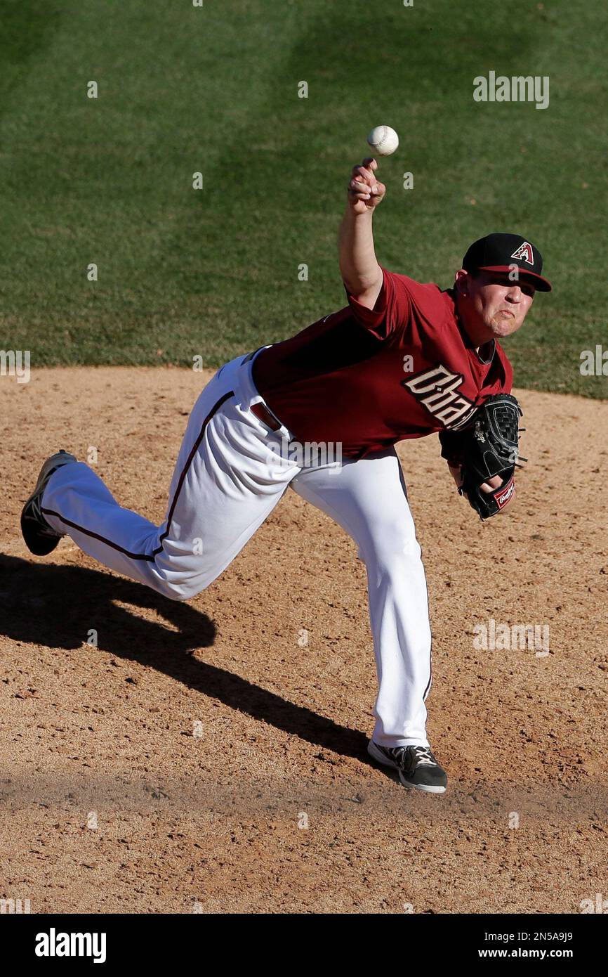 Arizona Diamondbacks relief pitcher Will Harris pitches to a Kansas ...