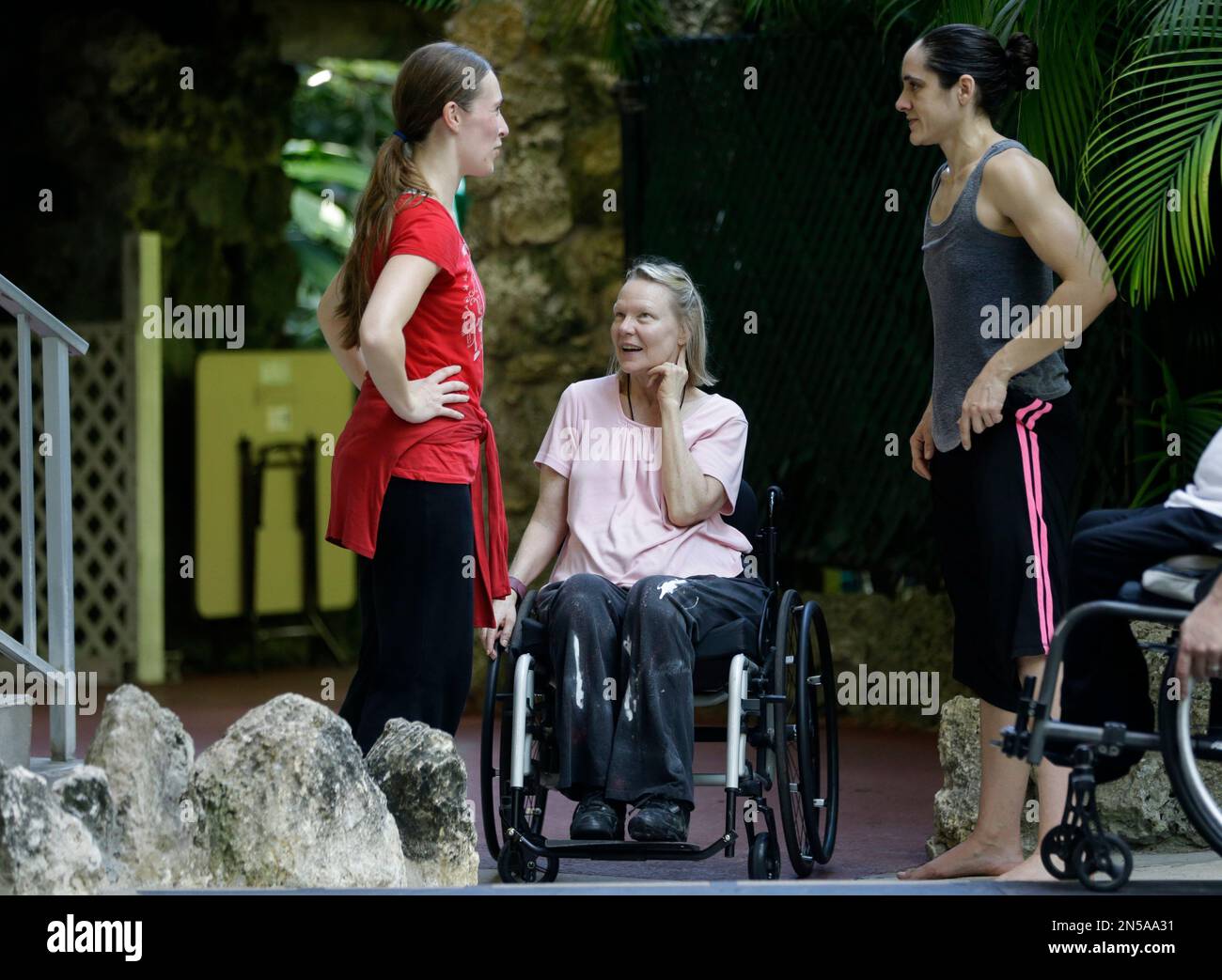In this Saturday, Feb. 1, 2014 photo, dancers Shawn Buller, center ...