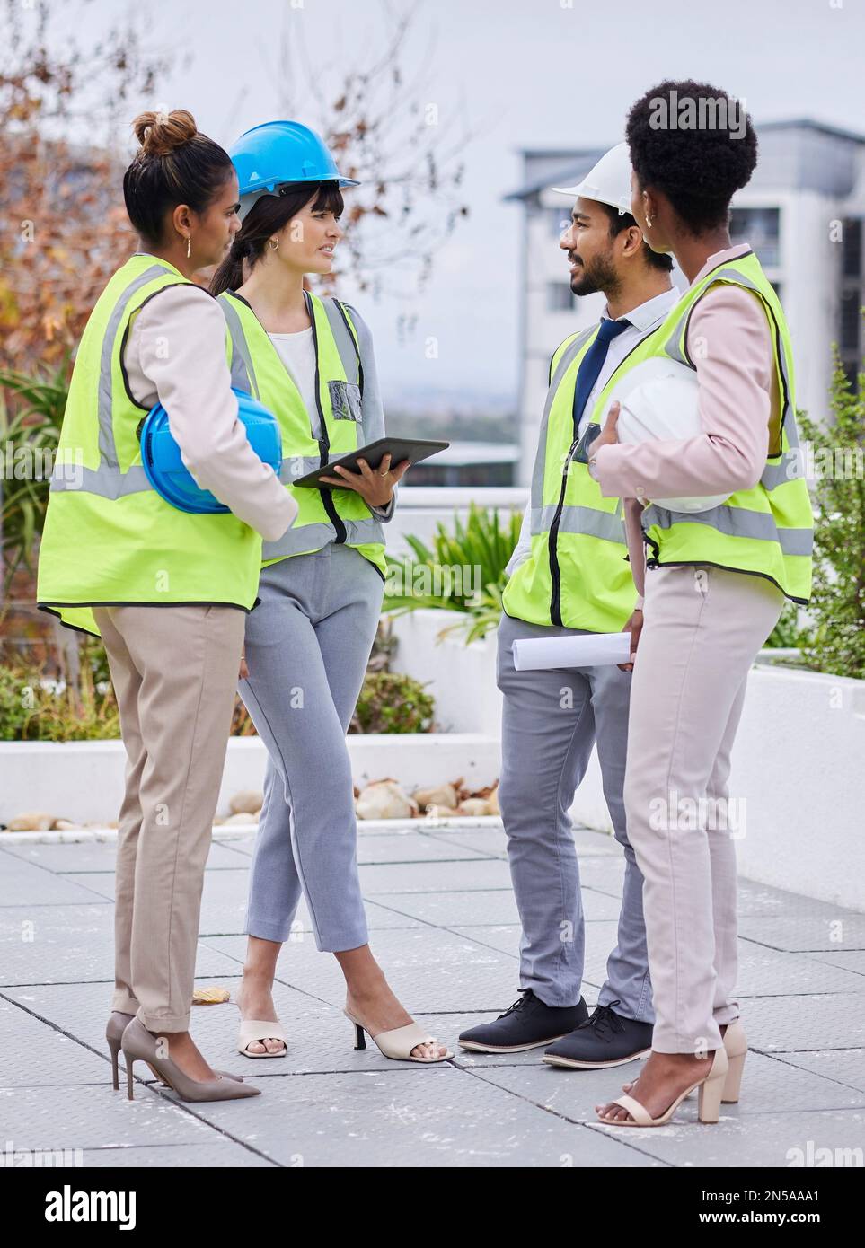 Architecture group discussion, tablet and planning vision, strategy or ...