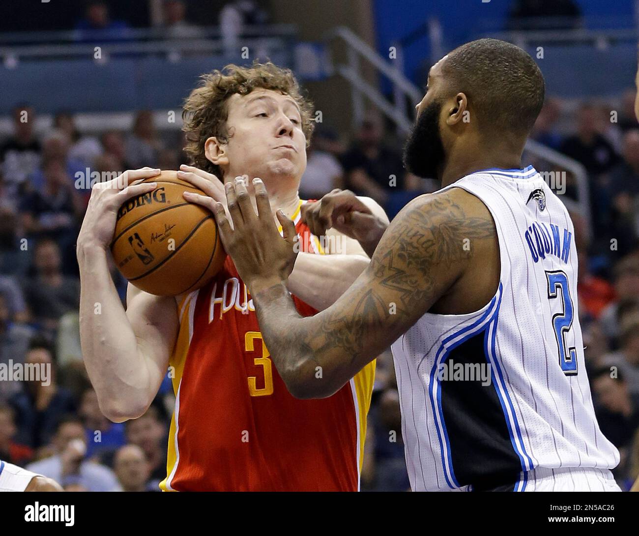 Houston Rockets' Omer Asik (3) tries to keep the ball from Orlando ...
