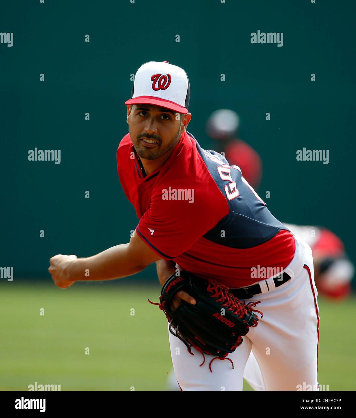 Washington Nationals starting pitcher Gio Gonzalez (47) warms up from ...