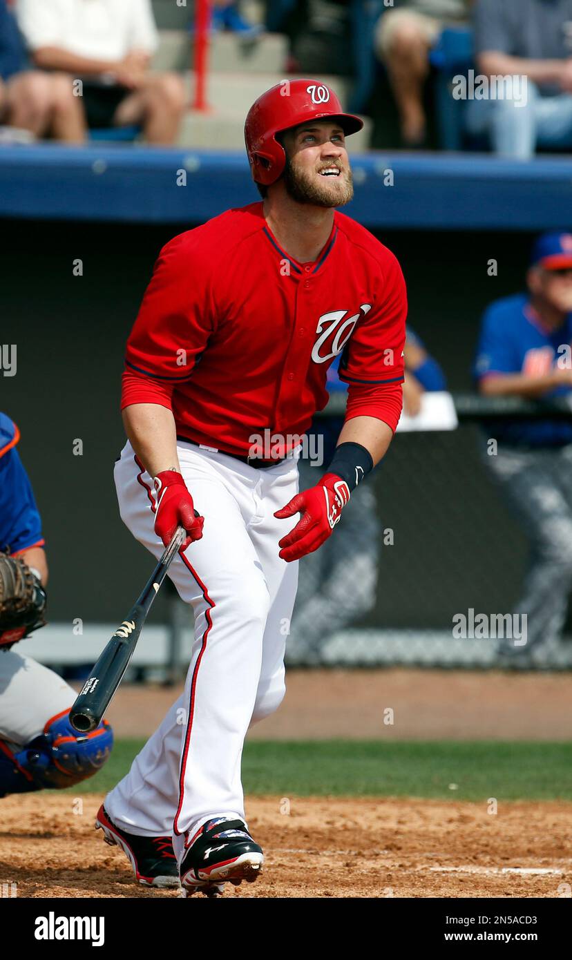 Washington Nationals left fielder Bryce Harper (34) bats in a spring ...