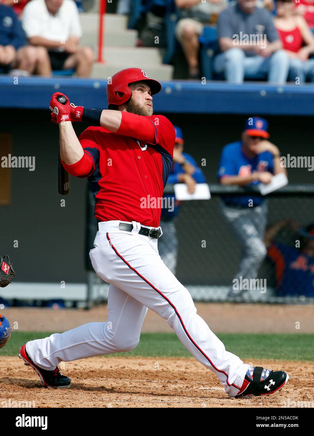 Washington Nationals left fielder Bryce Harper (34) bats in a spring ...
