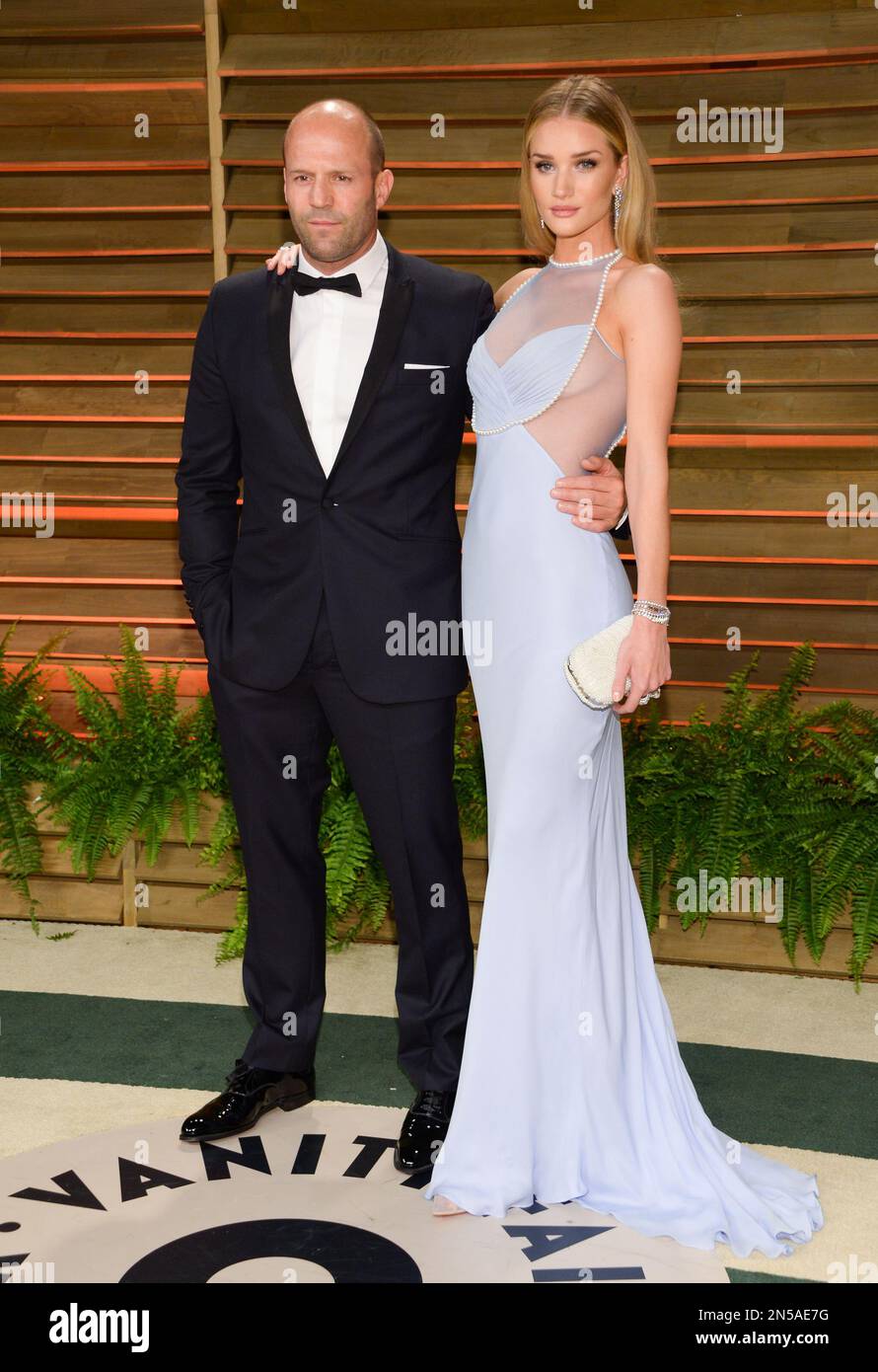 Jason Statham and girlfriend Rosie Huntington-Whiteley attend the 2014 ...