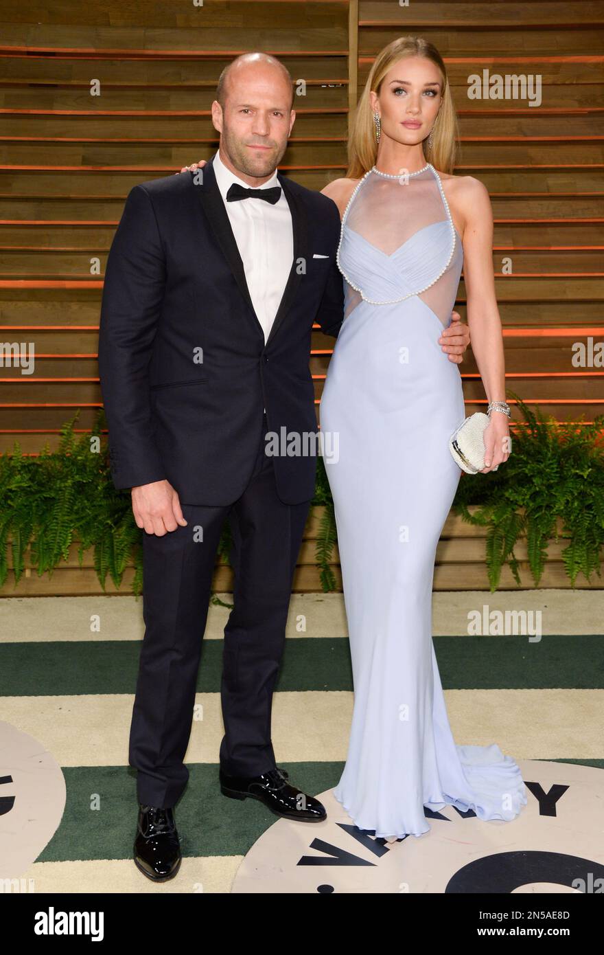 Jason Statham and girlfriend Rosie Huntington-Whiteley attend the 2014 ...
