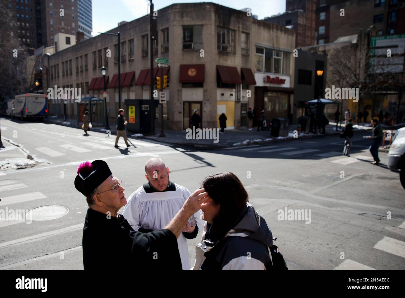 The Rev. Gordon Reid with Saint Clement's Episcopal Church, accompanied ...