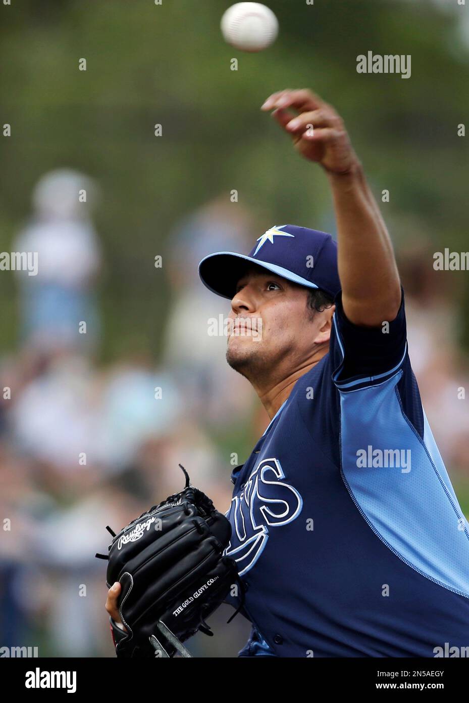Tampa Bay Rays pitcher Cesar Ramos delivers a warm-up throw in the ...