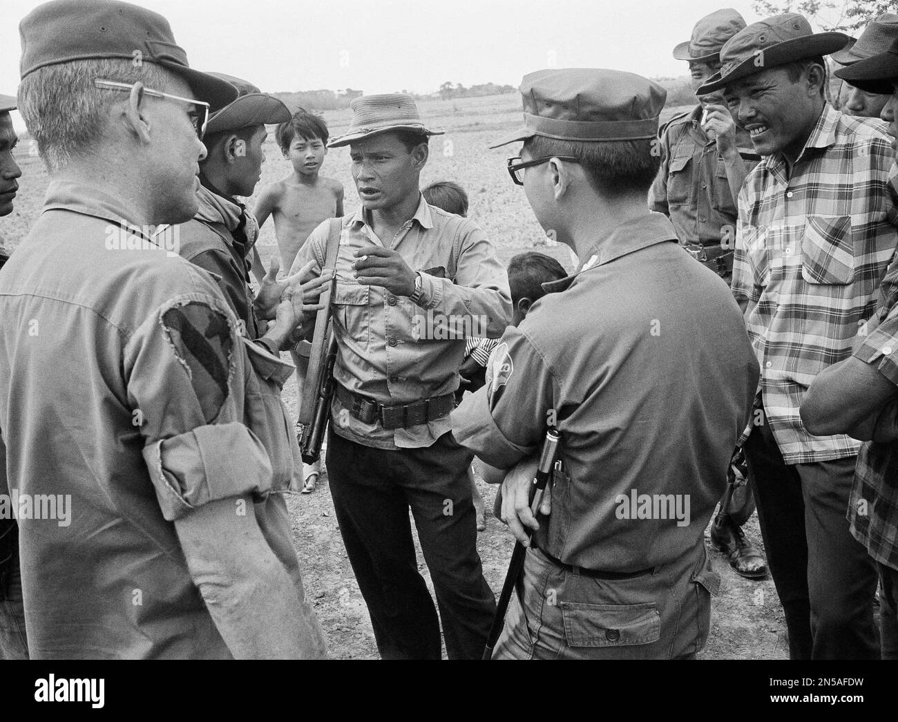 Col. Ernest P. Terrell Jr., left, senior U.S. adviser in Kien Tuong ...