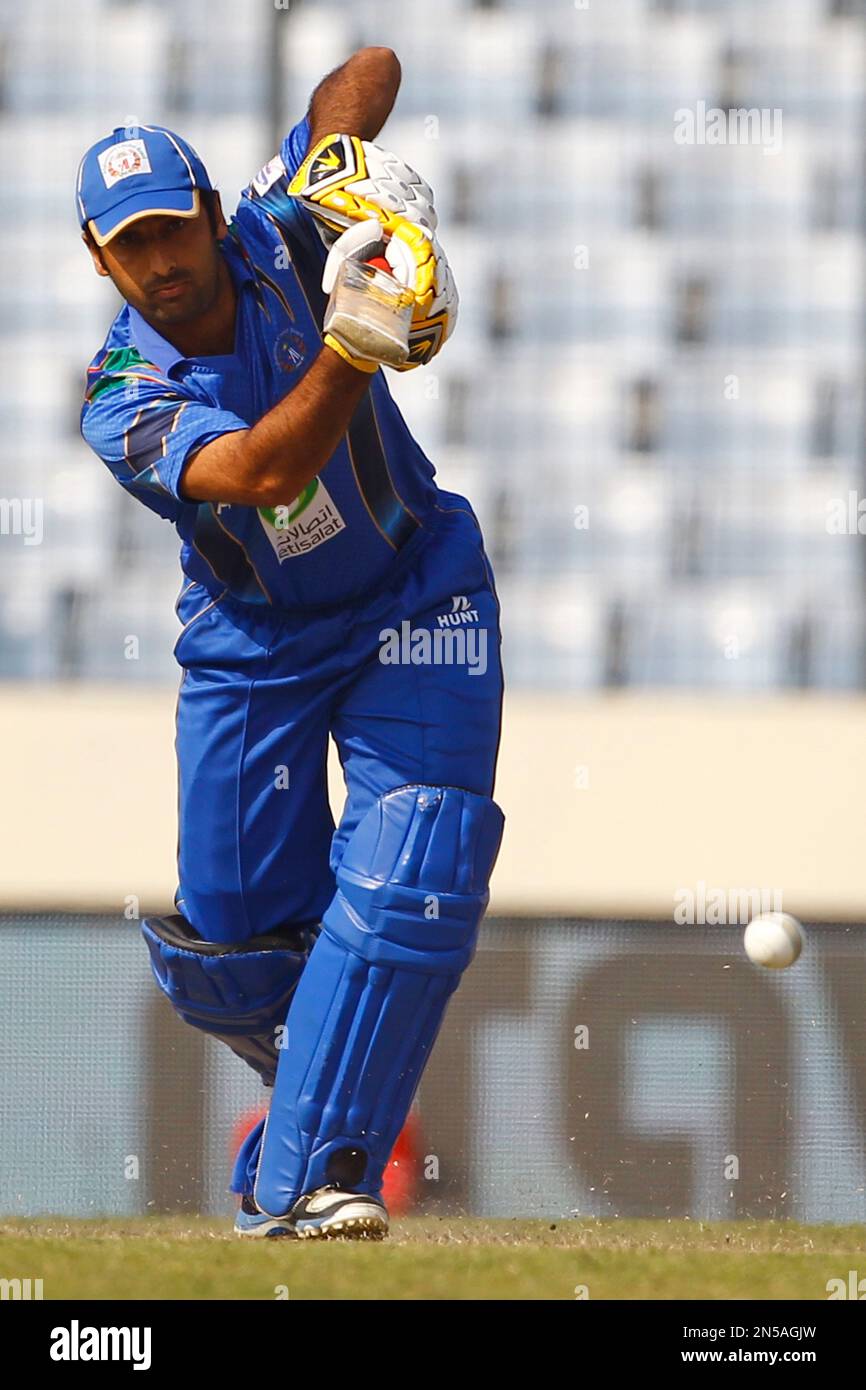 Afghan cricket player Asghar Stanikzai bats during the Asia Cup one-day ...