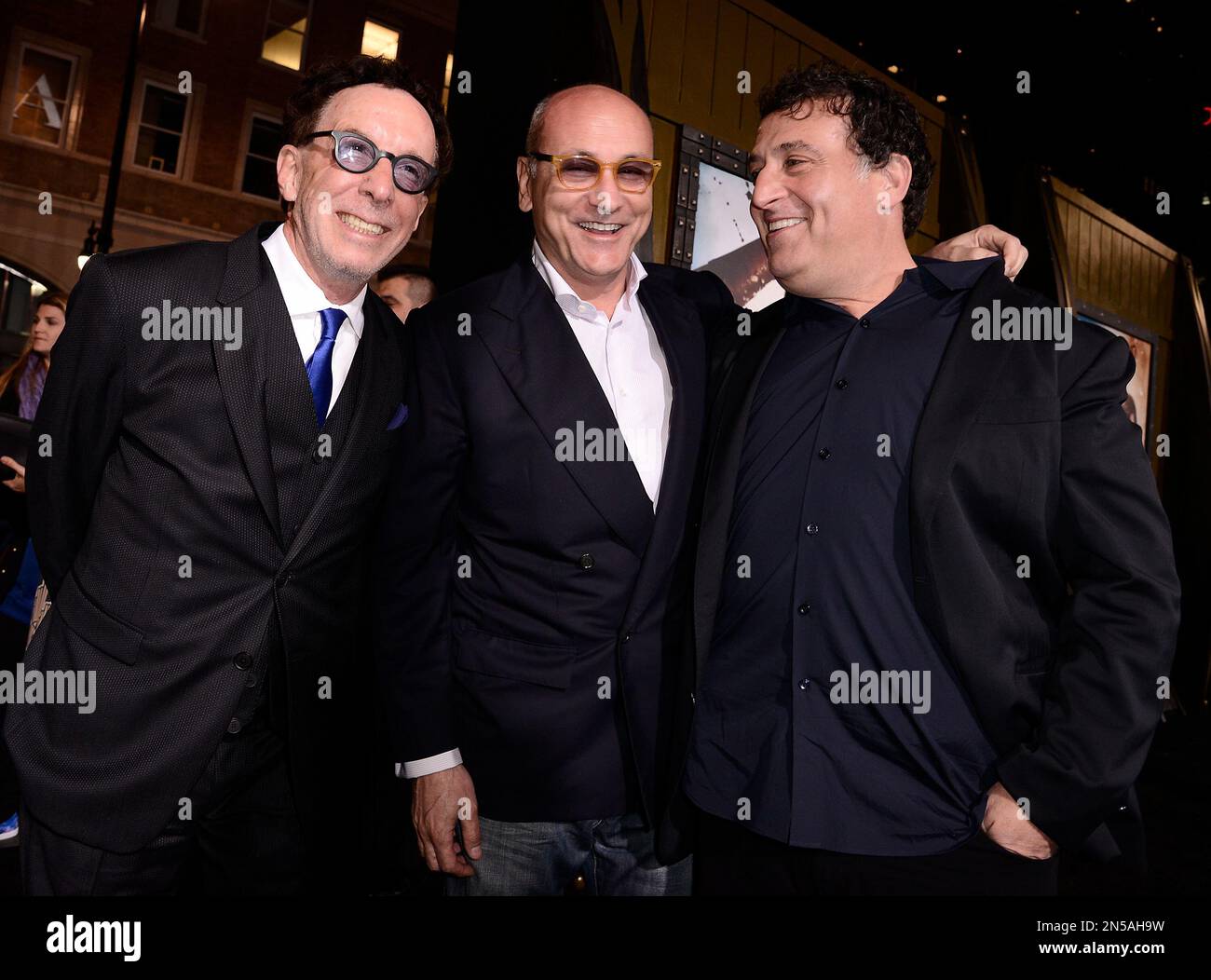 From left to right, producer Mark Canton, producer Gianni Nunnari, and ...