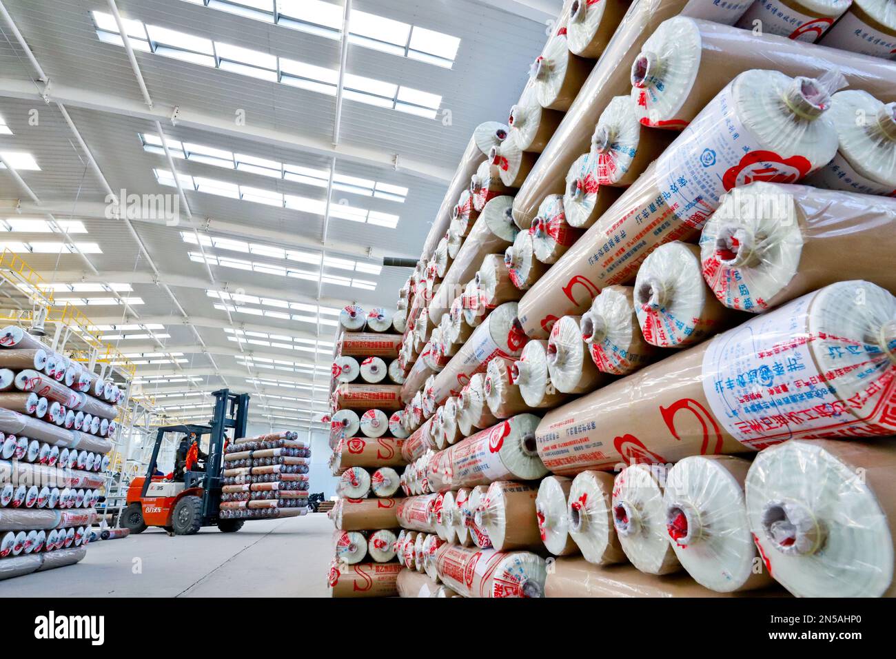 ZHANGYE, CHINA - FEBRUARY 9, 2023 - Workers load production ...