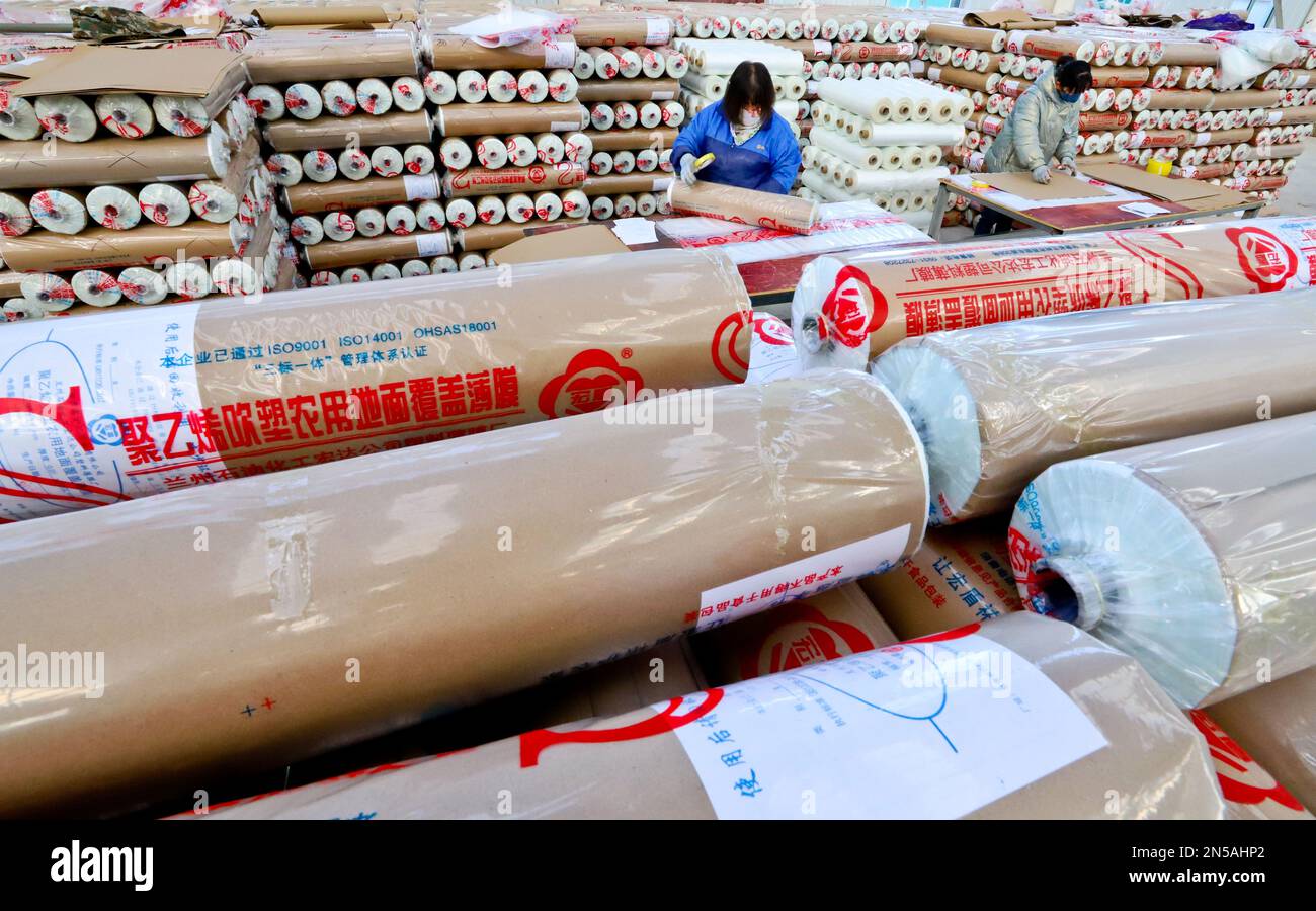 ZHANGYE, CHINA - FEBRUARY 9, 2023 - A worker packs agricultural film at ...