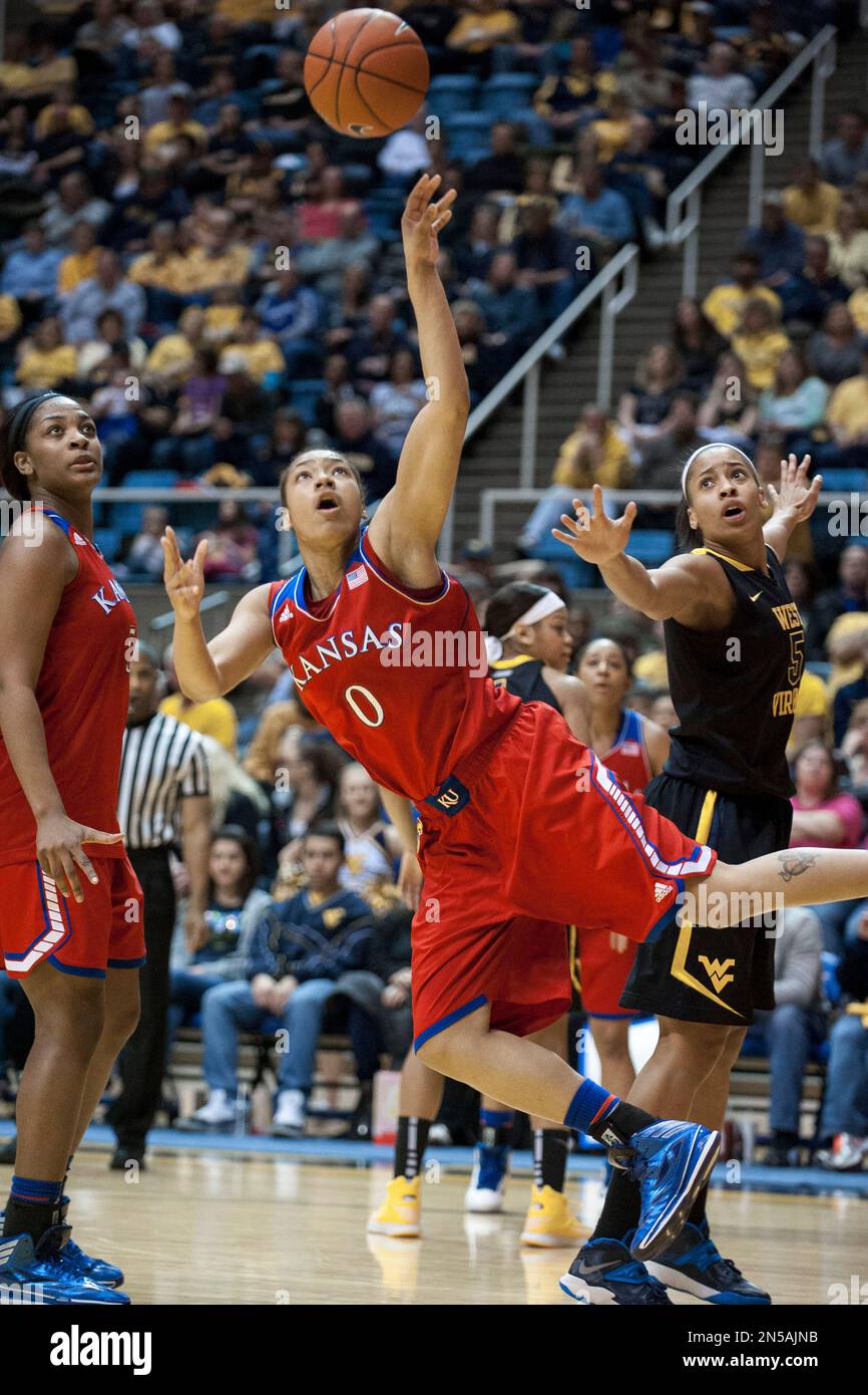 Kansas' Asia Boyd (0) drives to the basket during the first half of an ...
