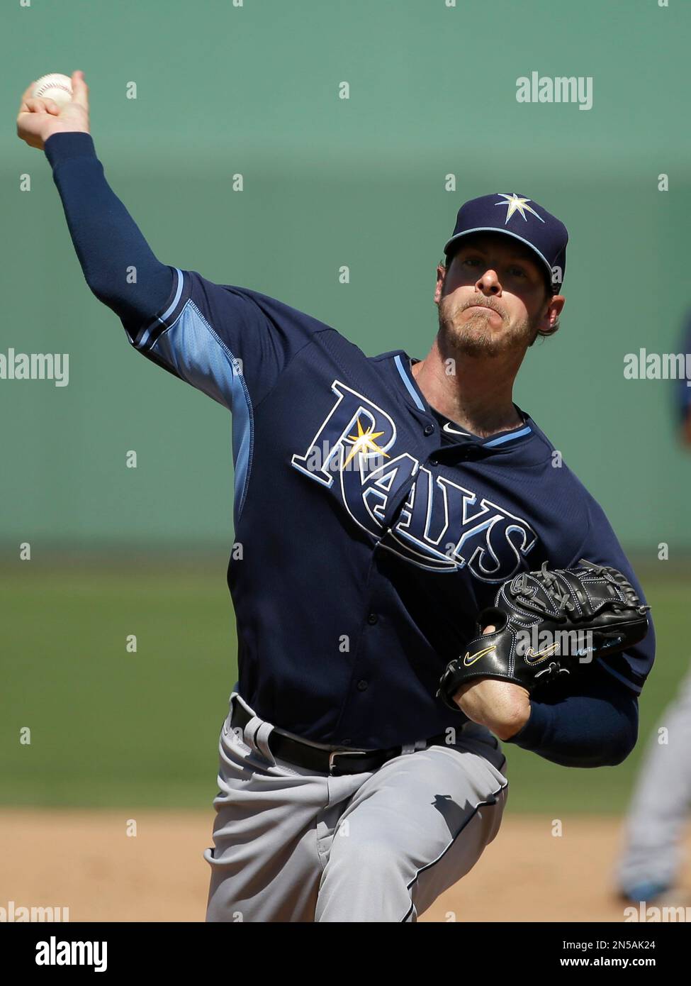 Tampa Bay Rays pitcher Mark Lowe delivers a warm-up throw in the third ...