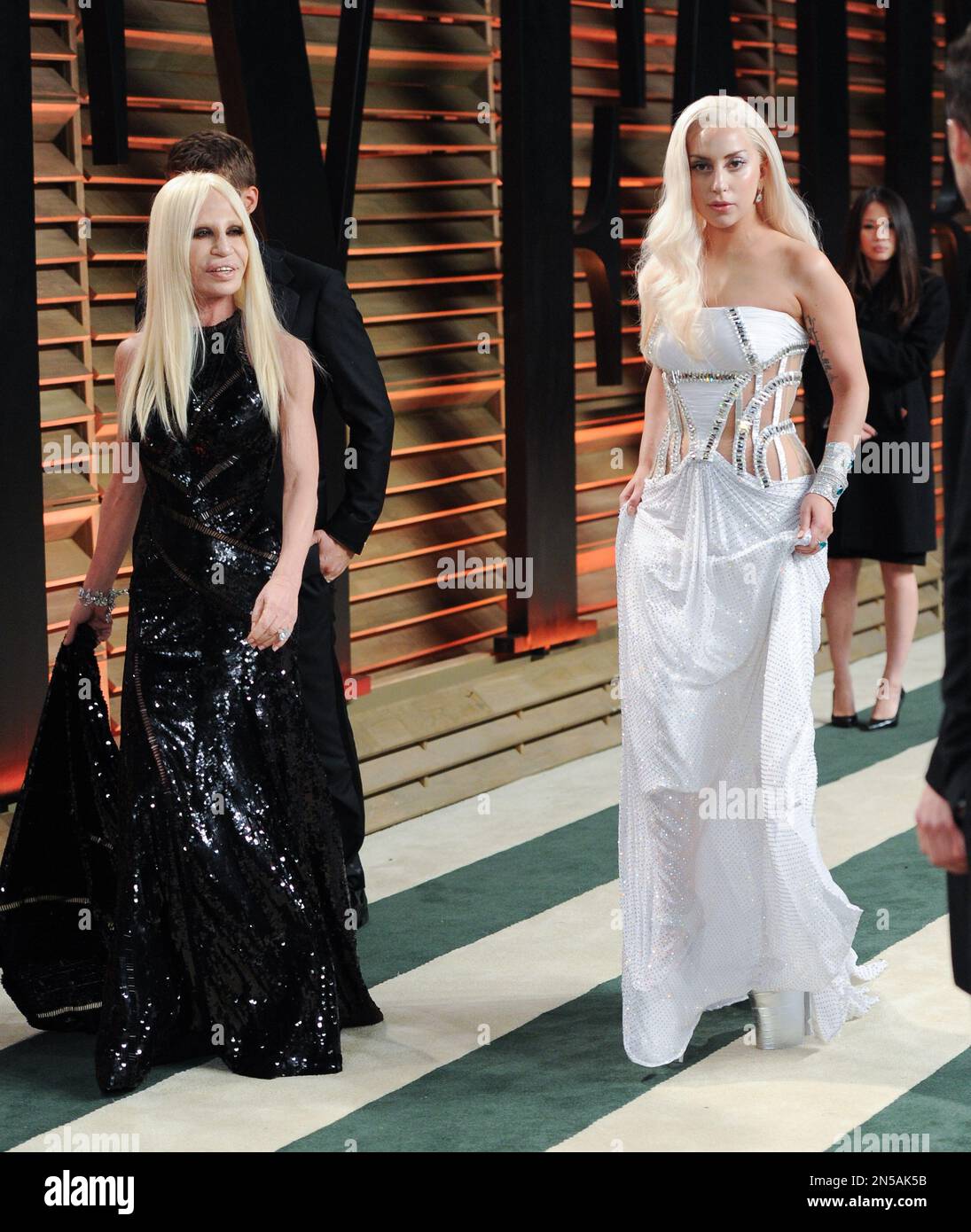 Donatella Versace, Nolan Funk, Lady Gaga attend the 2014 Vanity Fair ...