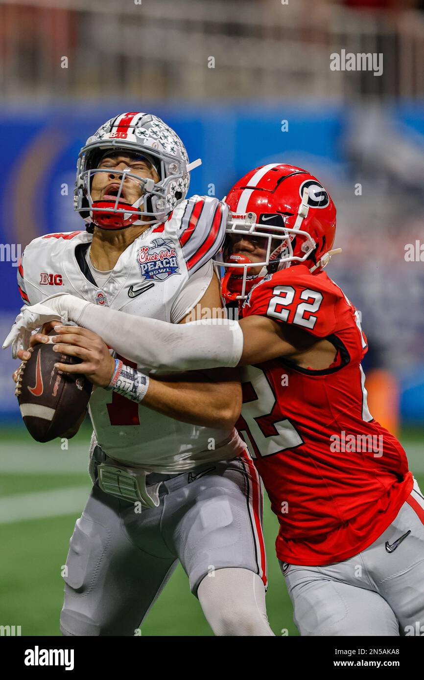 December 31, 2022: Ohio State's CJ Stroud (7) is hit and sacked by ...