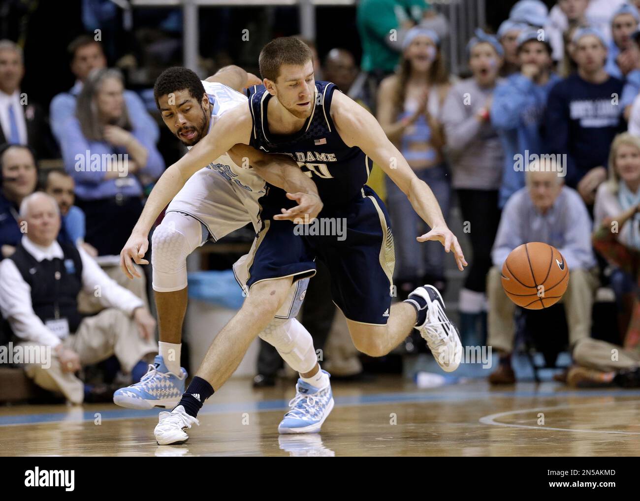 North Carolina's James Michael McAdoo, left, and Notre Dame's Austin ...