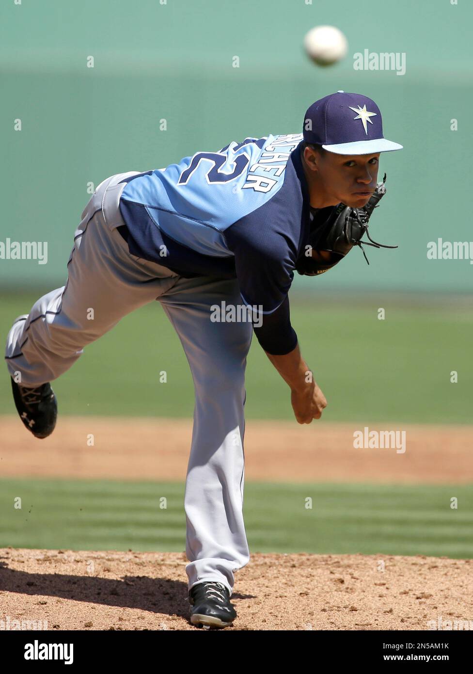 Tampa Bay Rays pitcher Chris Archer delivers a warm-up pitch in the ...