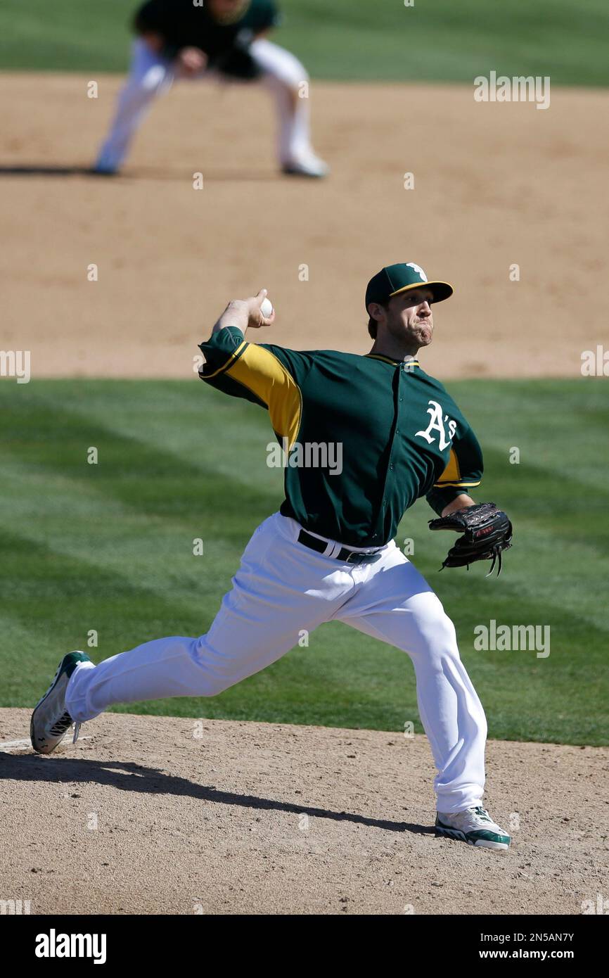 Oakland Athletics relief pitcher Josh Lindblom pitches to a Los Angeles ...