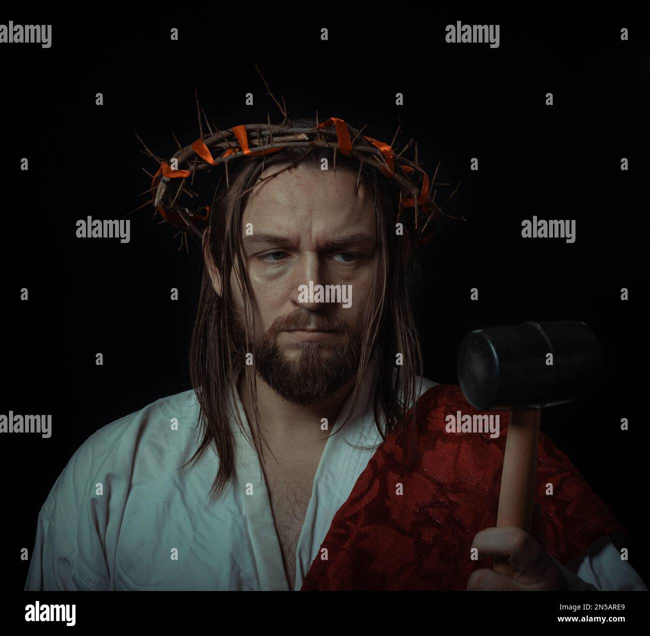 Jesus Christ wearing a crown of thorns and white chiton toga mantle ...