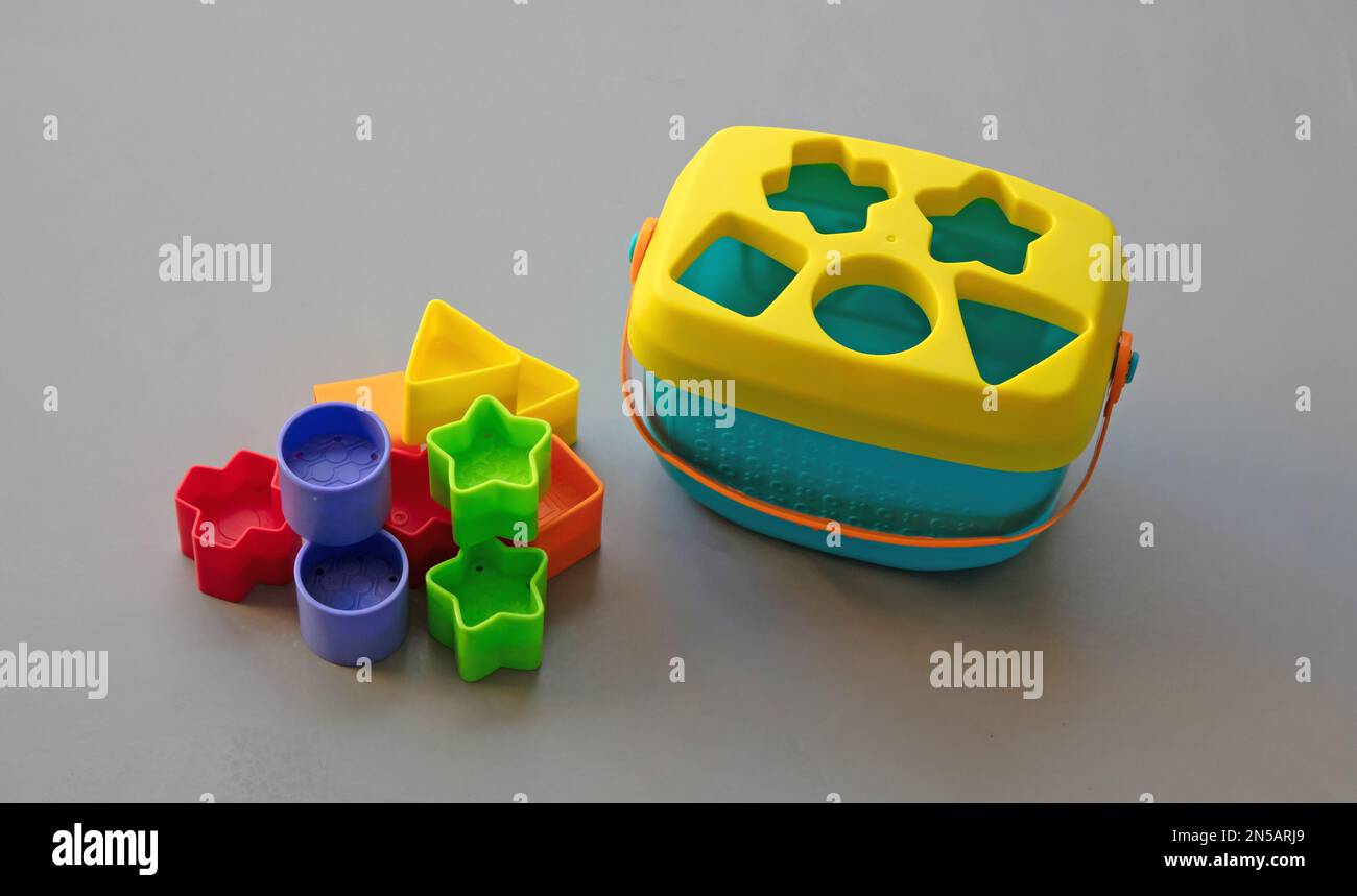 Baby logical cube on isolated grey background Stock Photo - Alamy