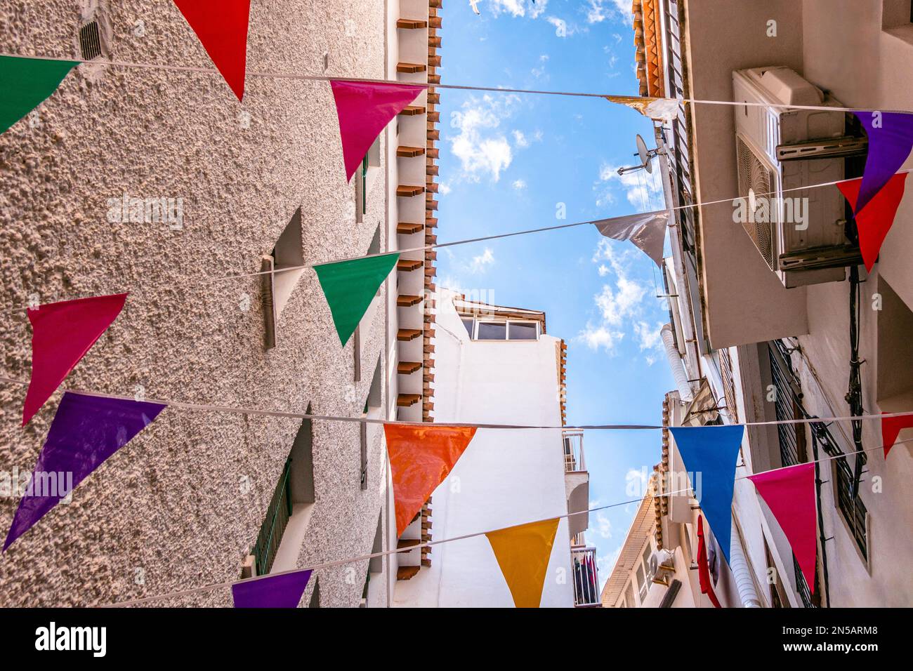Garland of colorful triangle shape fabric bunting flags, pennants over ...