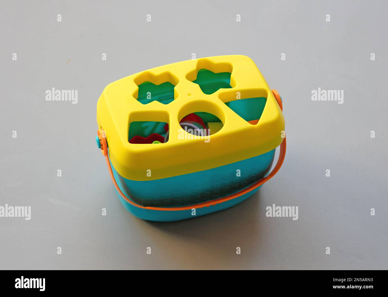 Baby logical cube on isolated grey background Stock Photo - Alamy