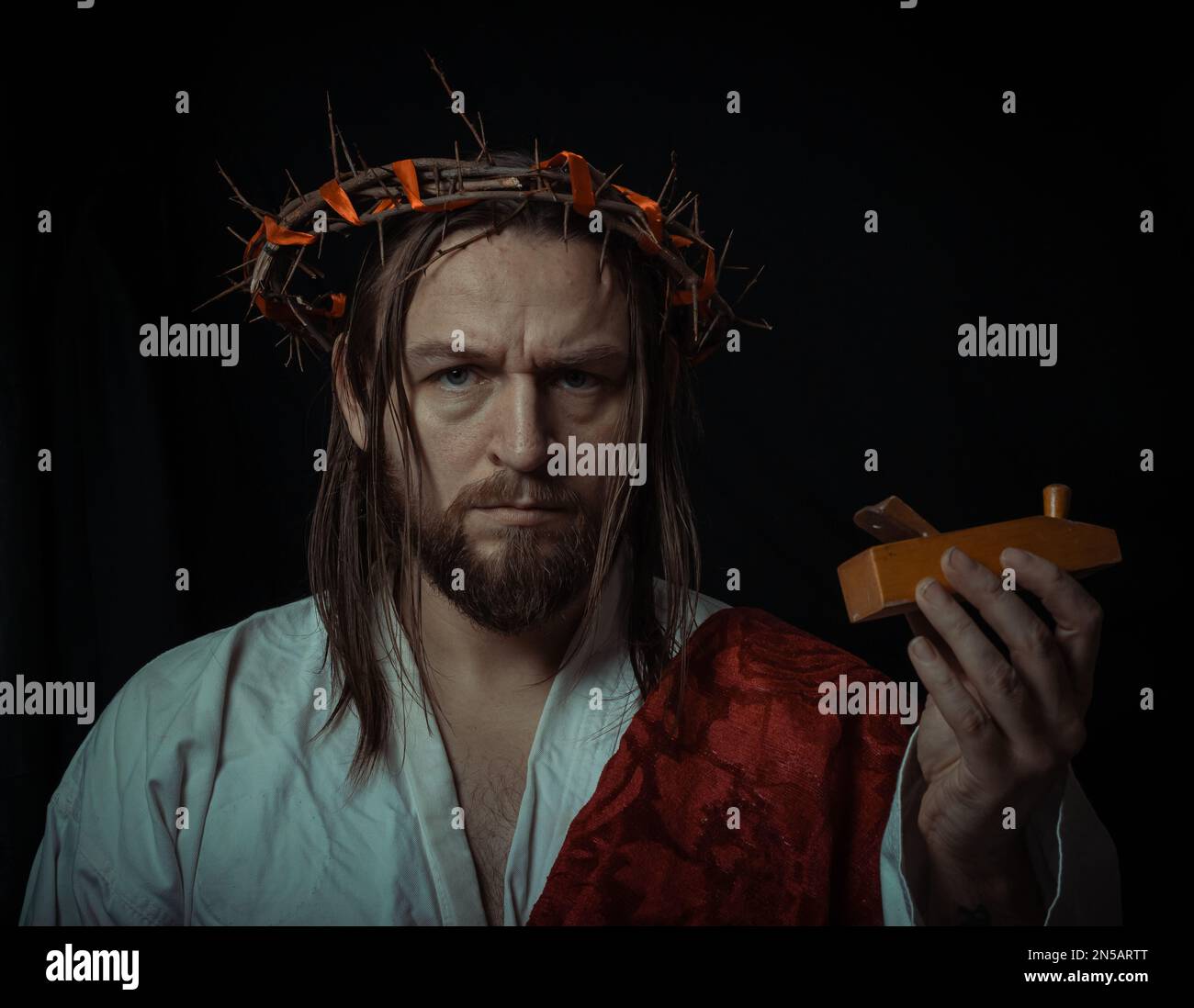 Jesus Christ wearing a crown of thorns and white chiton toga mantle ...