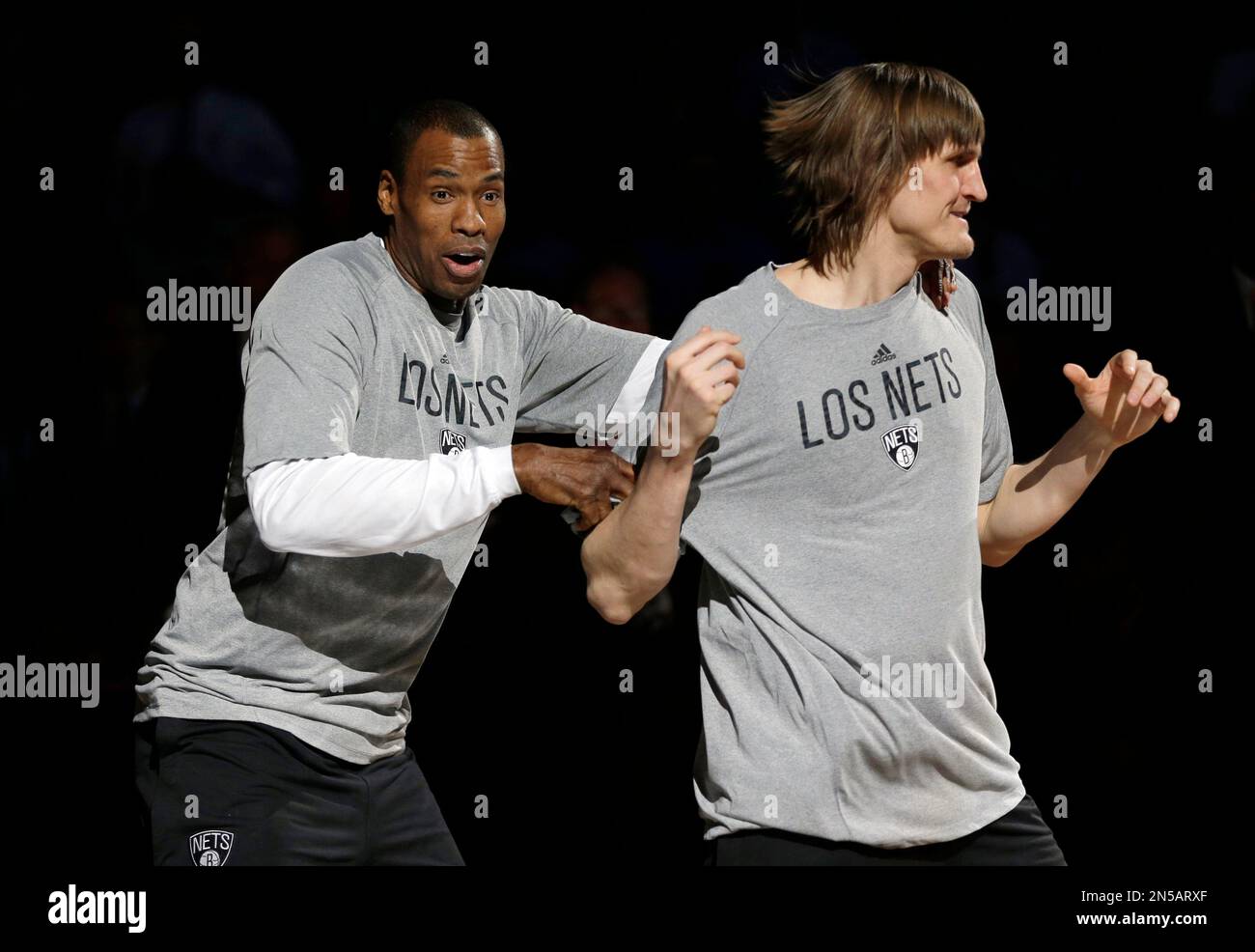 Brooklyn Nets' Jason Collins, left, and Andrei Kirilenko join the ...