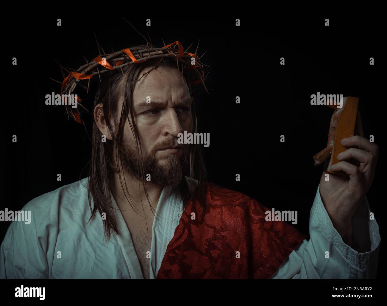 Jesus Christ wearing a crown of thorns and white chiton toga mantle ...