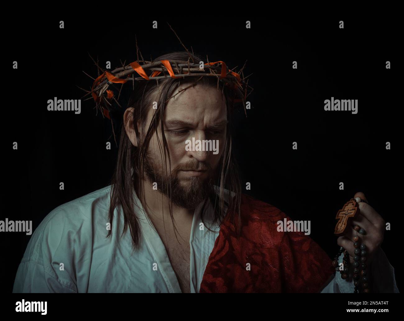 Jesus Christ wearing a crown of thorns and white chiton toga mantle ...